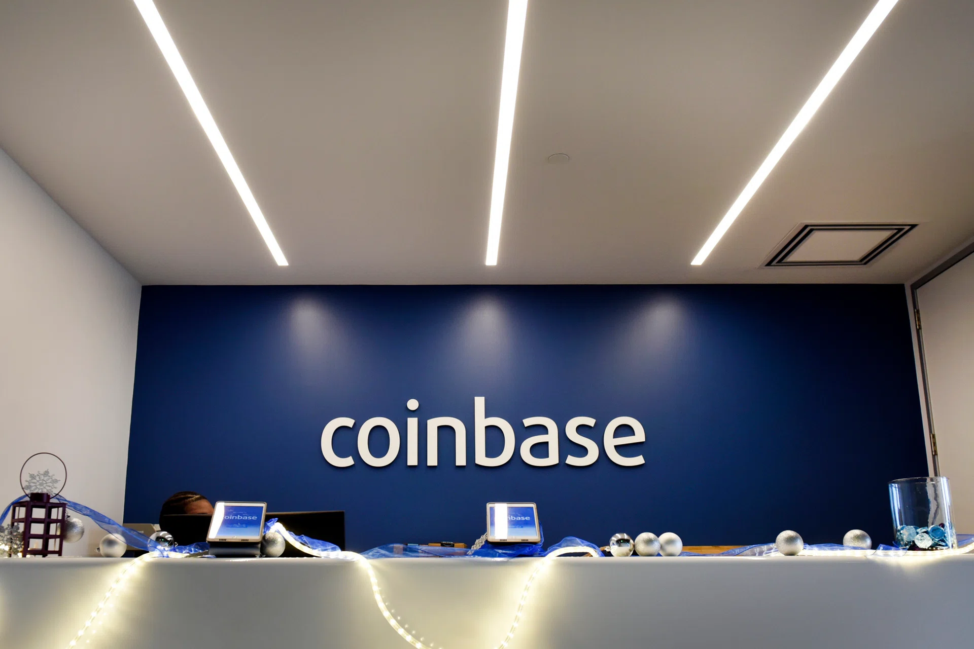 Crypto exchange Coinbase posts smaller first-quarter loss - The Business Times