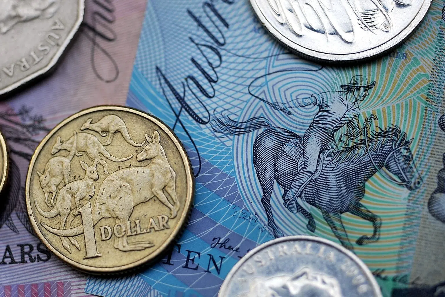 Australian dollar heads for 4th week of losses as rate risks mount