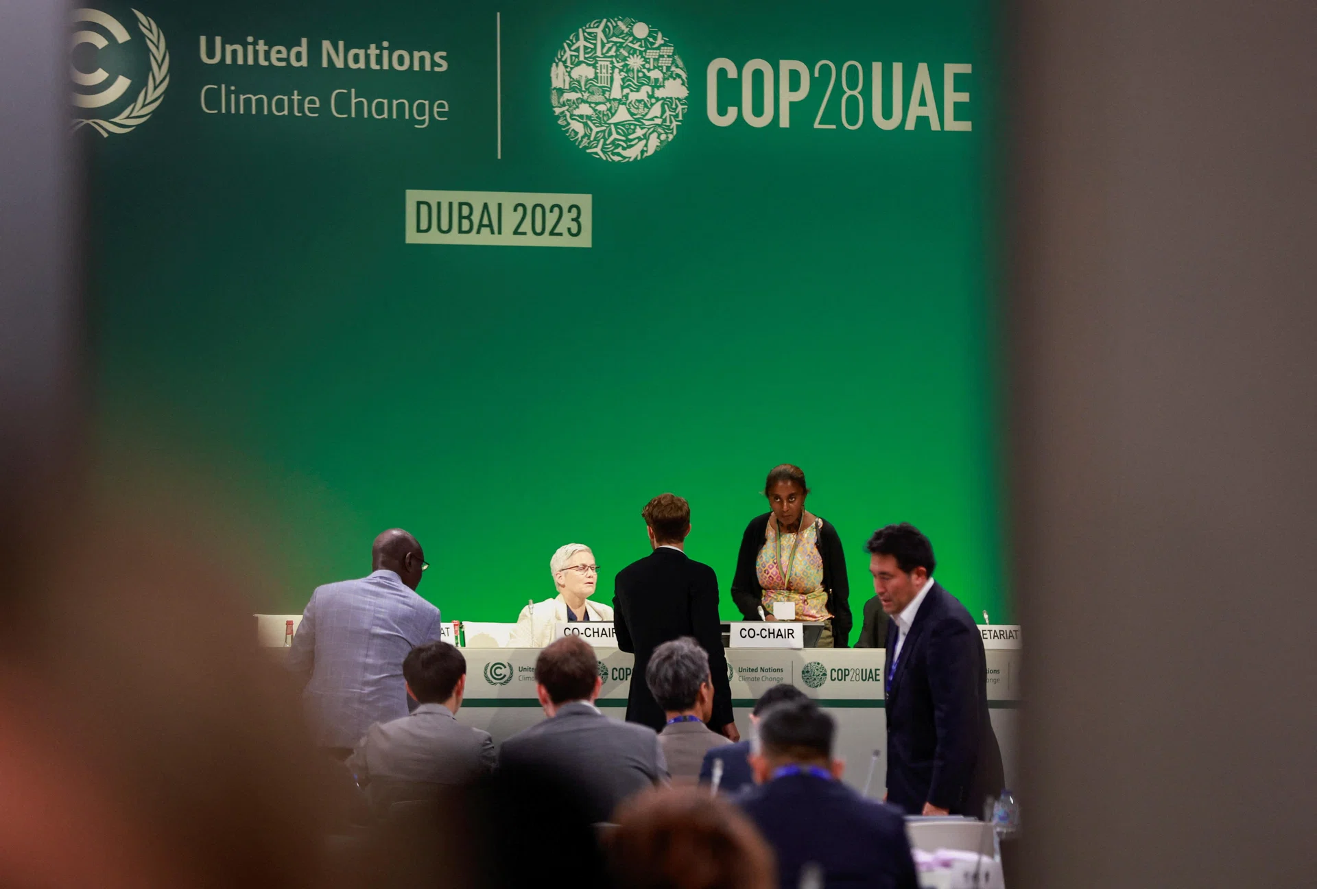 Proposed COP28 climate deal calls for 'transitioning away from fossil ...