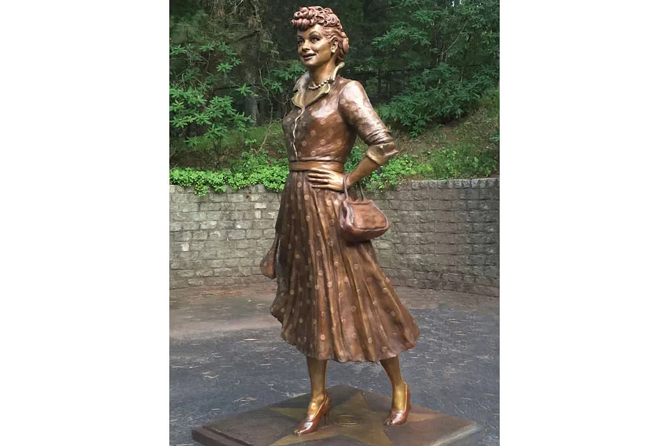 Here's Lucy! 'Scary' statue is replaced with one that looks like her ...