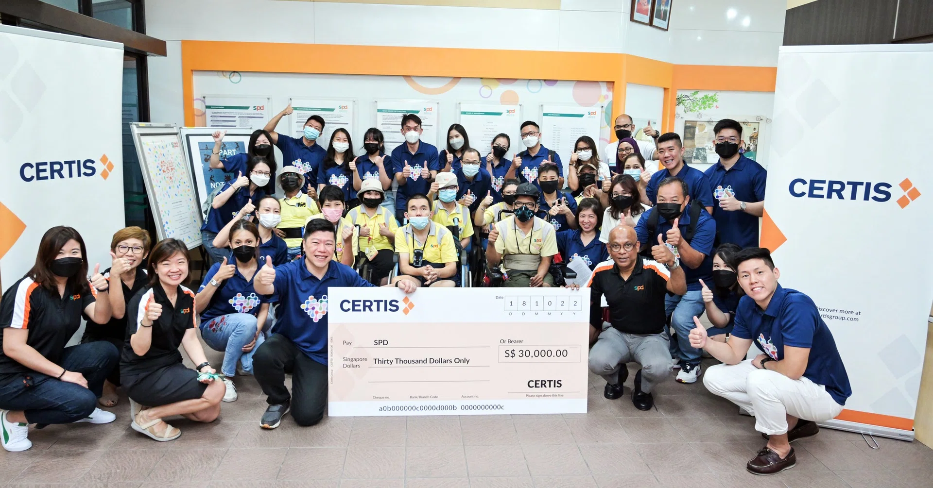 Certis donates S$30,000 to SPD to support persons with disabilities ...