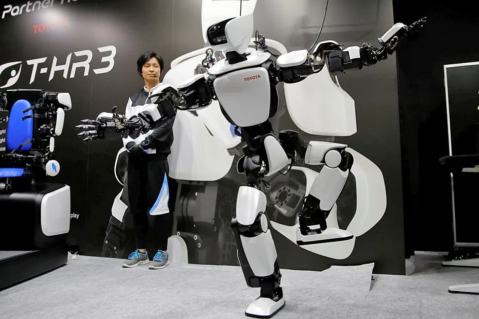 Toyota showcases humanoid robot that mirrors user - The Business Times