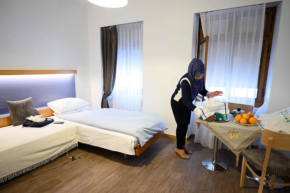 Homeless taste 'luxury' at Geneva hotel during pandemic