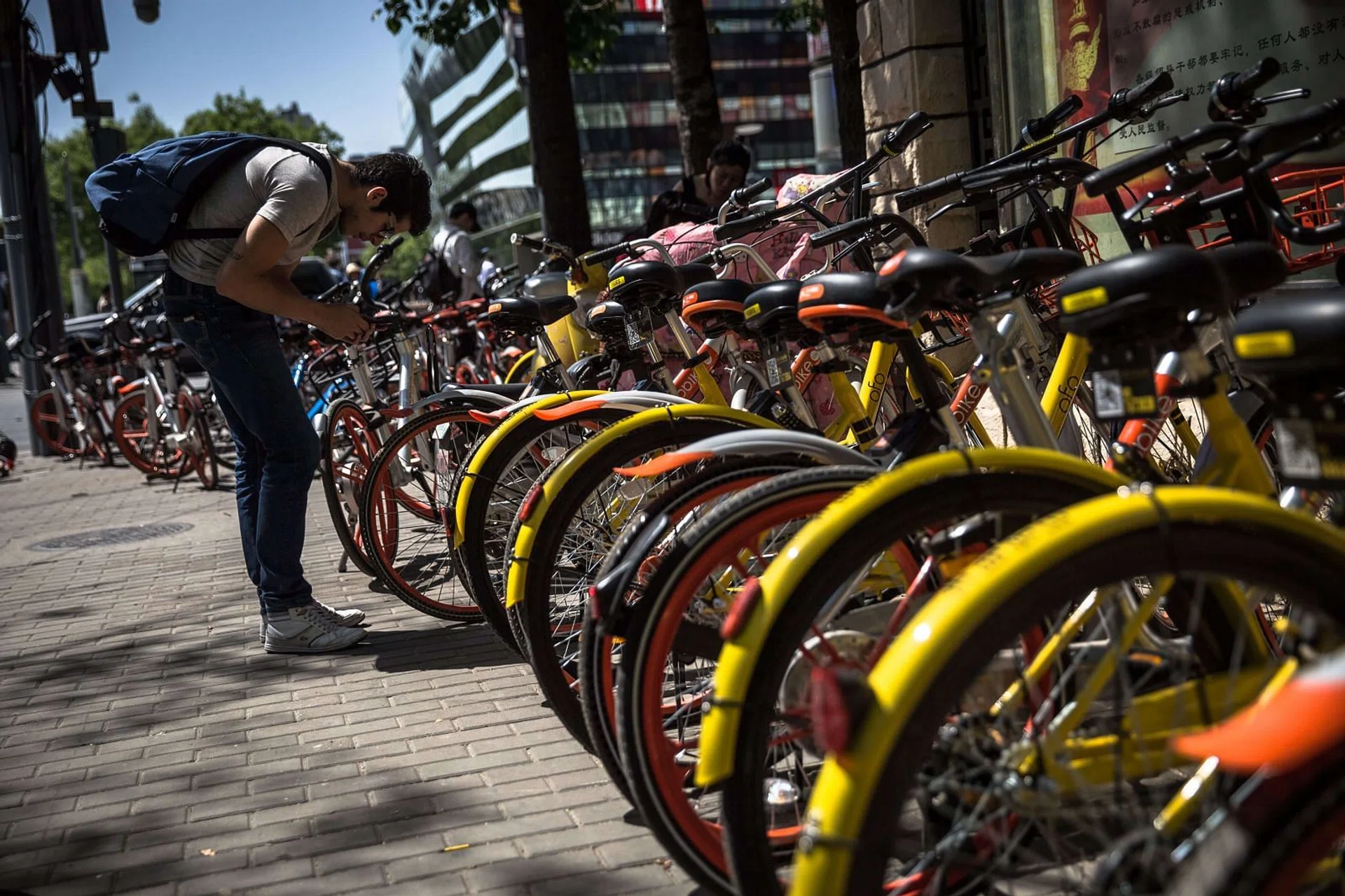 China's bike wars escalate as Didi throws weight behind Ofo - The ...