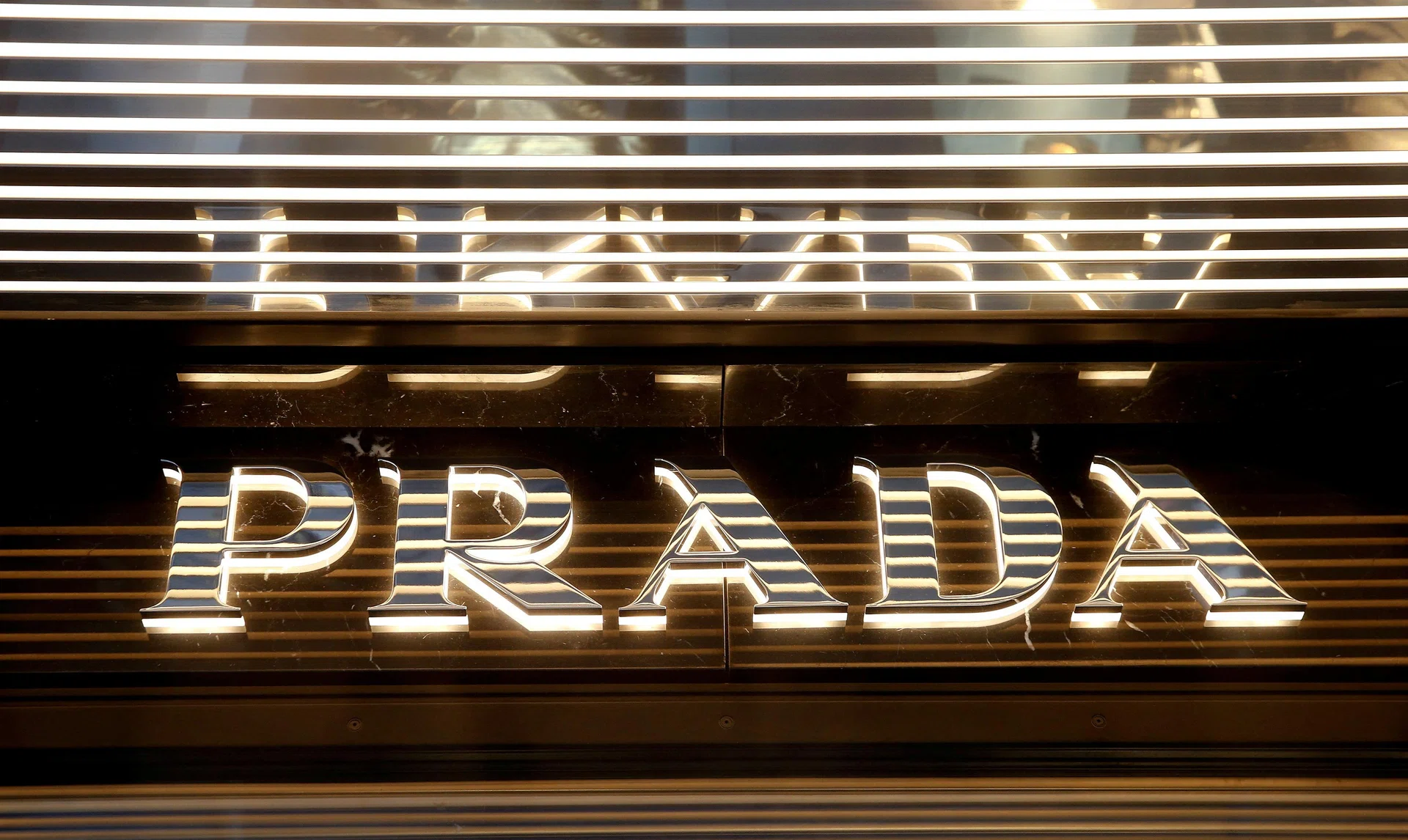 Prada appoints former Luxottica chief Guerra as new CEO - The Business ...