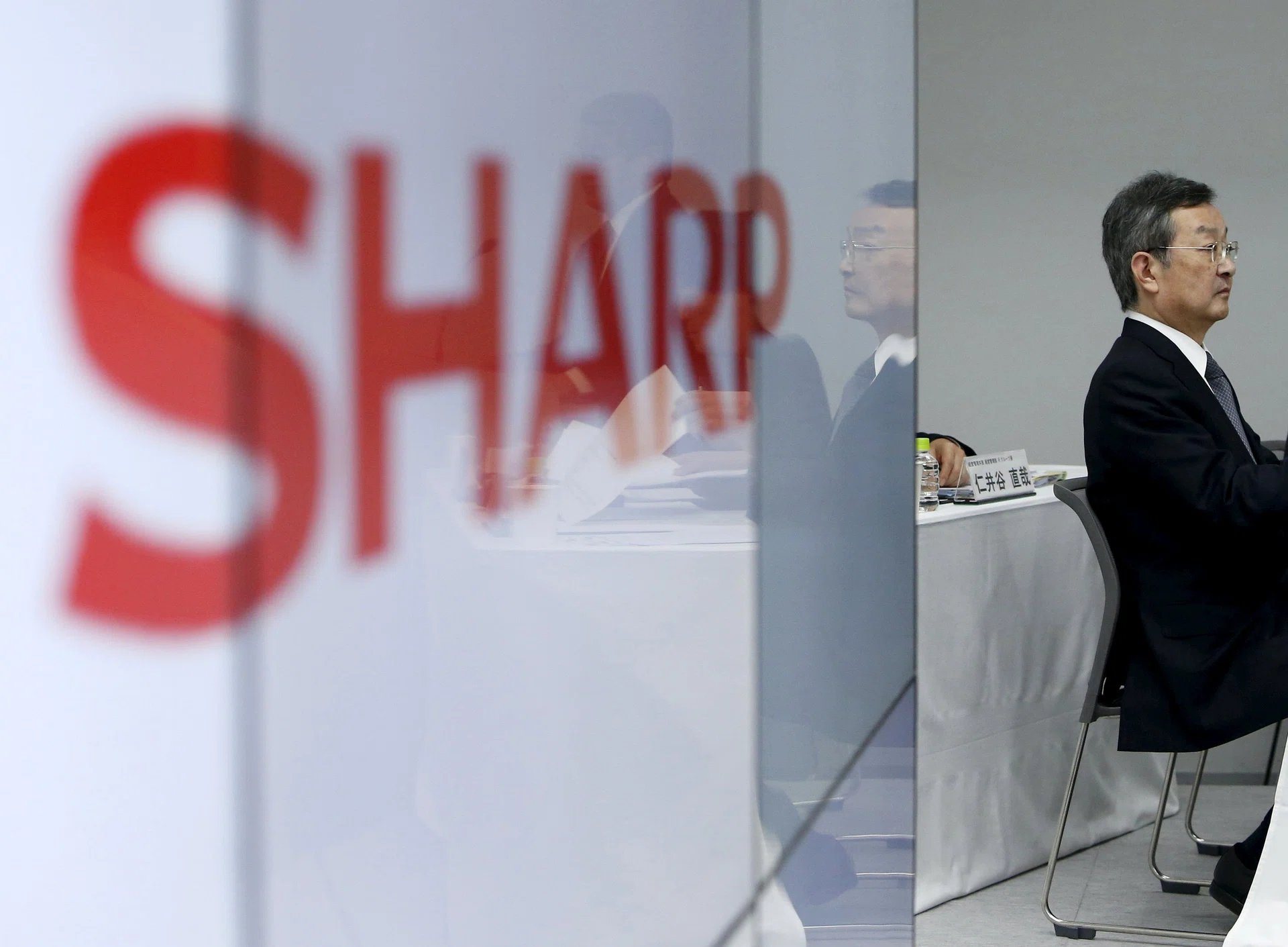 Japan's Sharp decides to accept Foxconn takeover offer: source - The ...