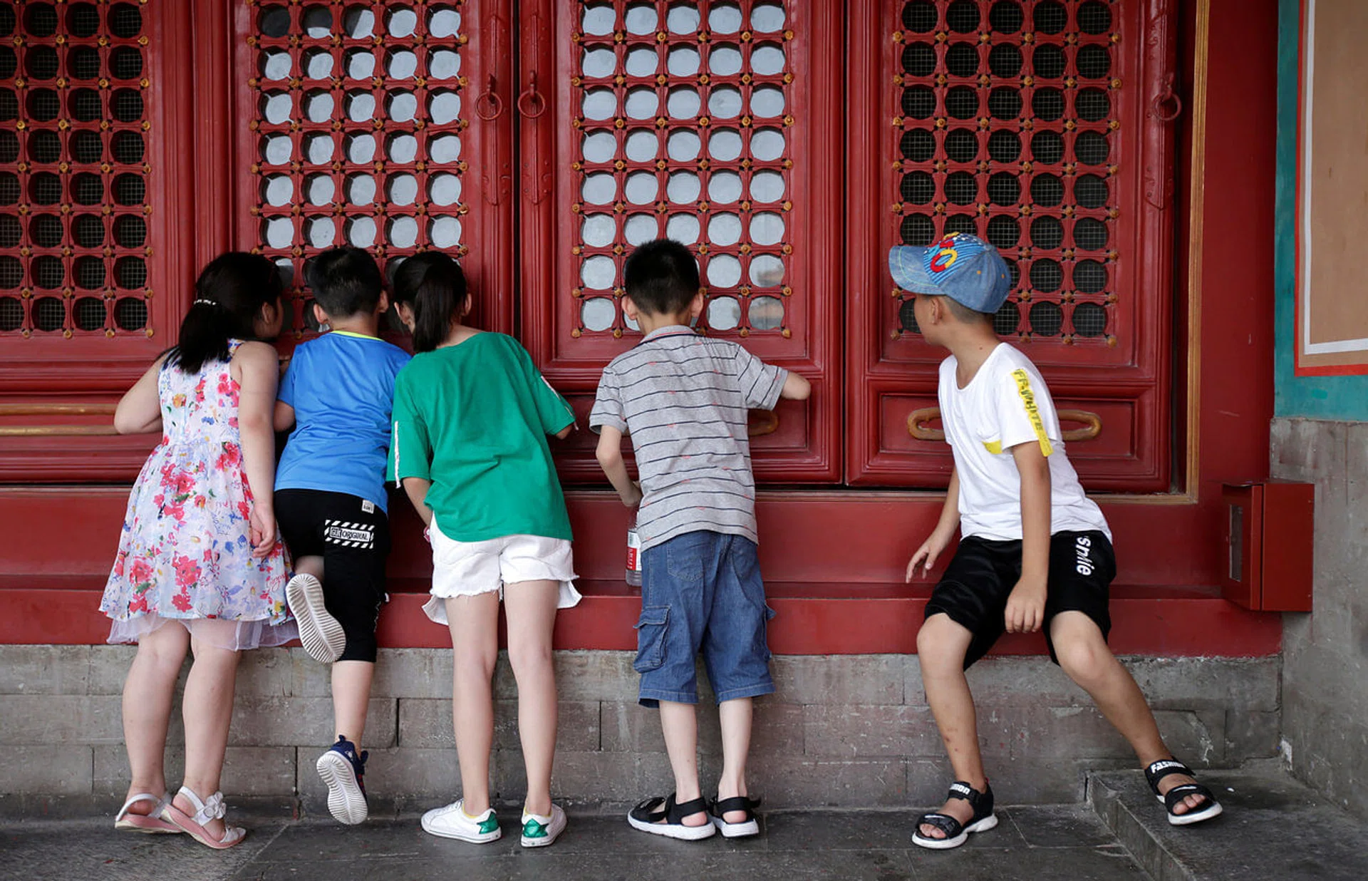 China may scrap two-child limit: report - The Business Times