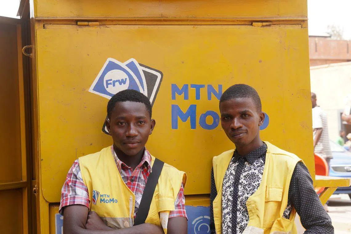 No smartphone? A mobile money agent can assist you in Kigali, Rwanda ...