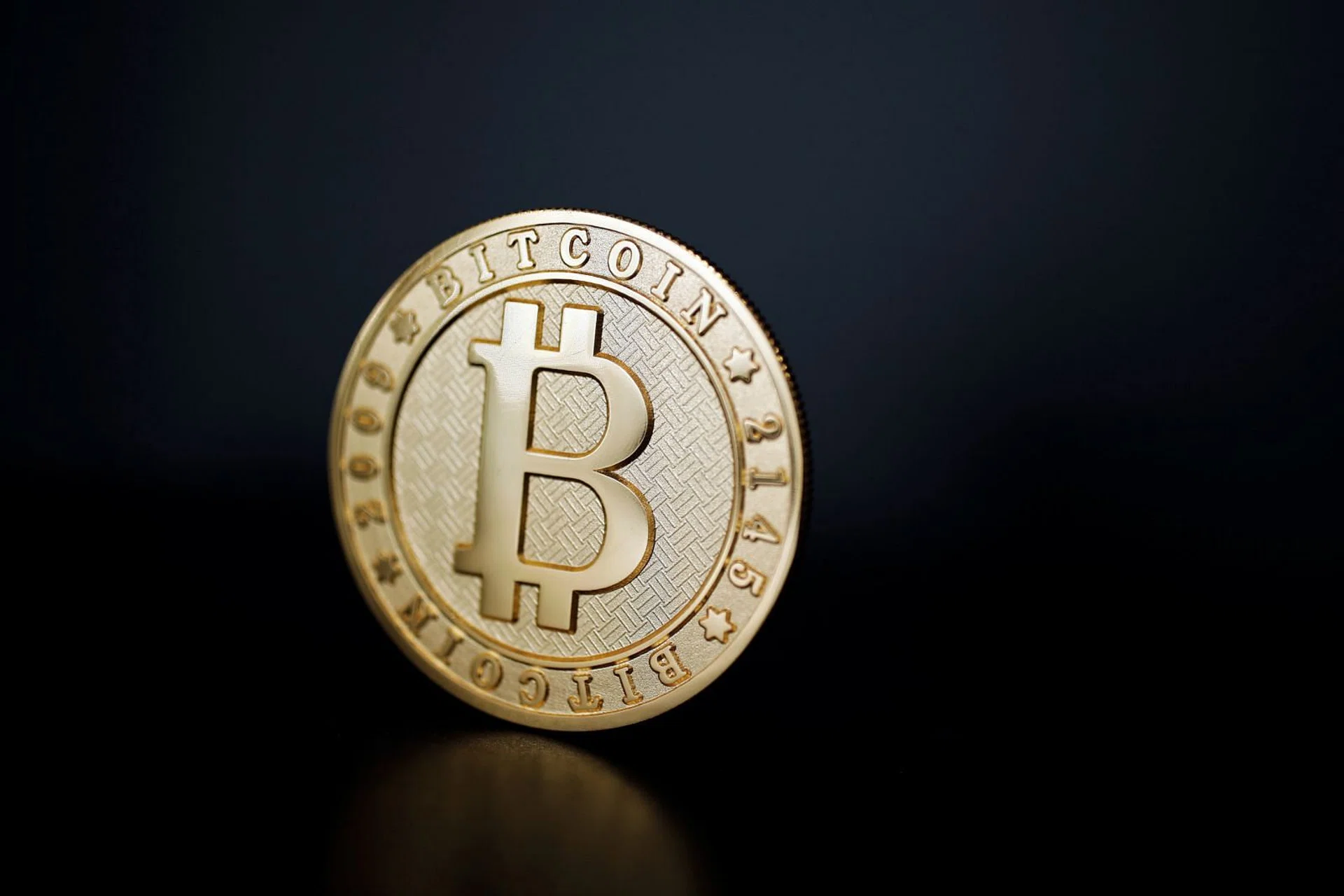US charges British Bitcoin dealer with fraud - The Business Times