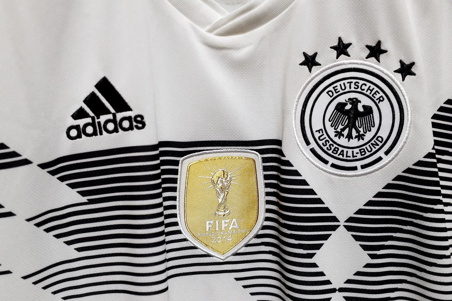 Adidas wins World Cup race, but Nike kicks back at ground level
