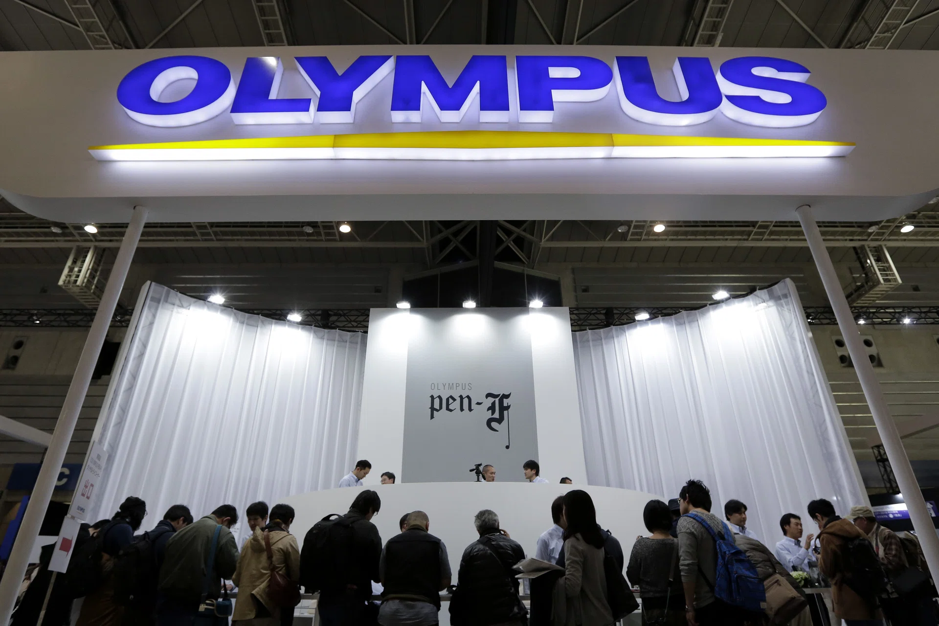 Olympus to pay US$646 million to end kickback, bribe probes - The ...