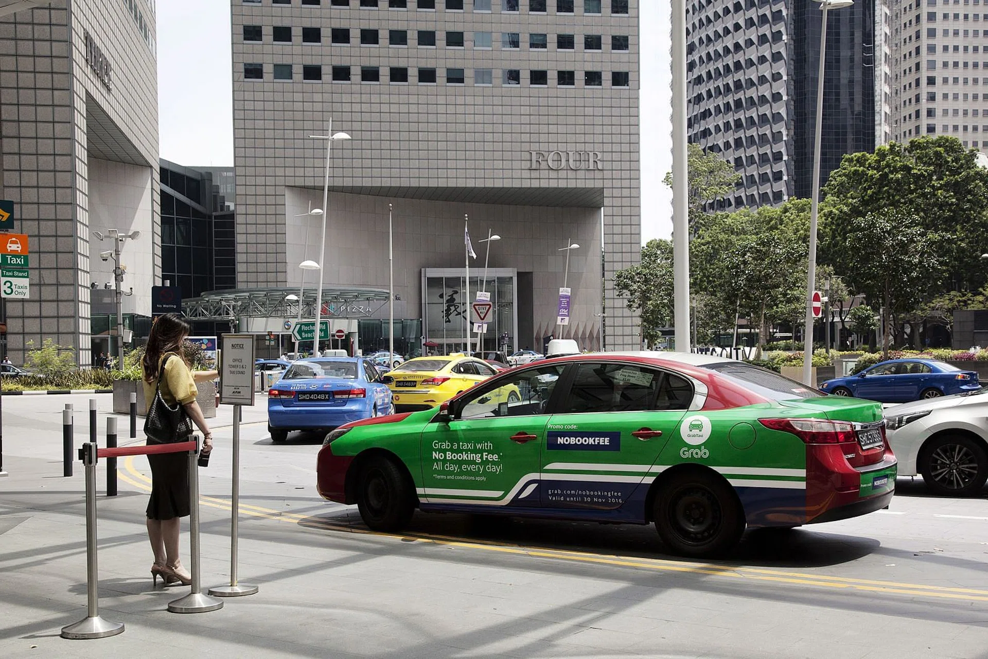 SMRT in talks to sell taxi business to Grab - The Business Times