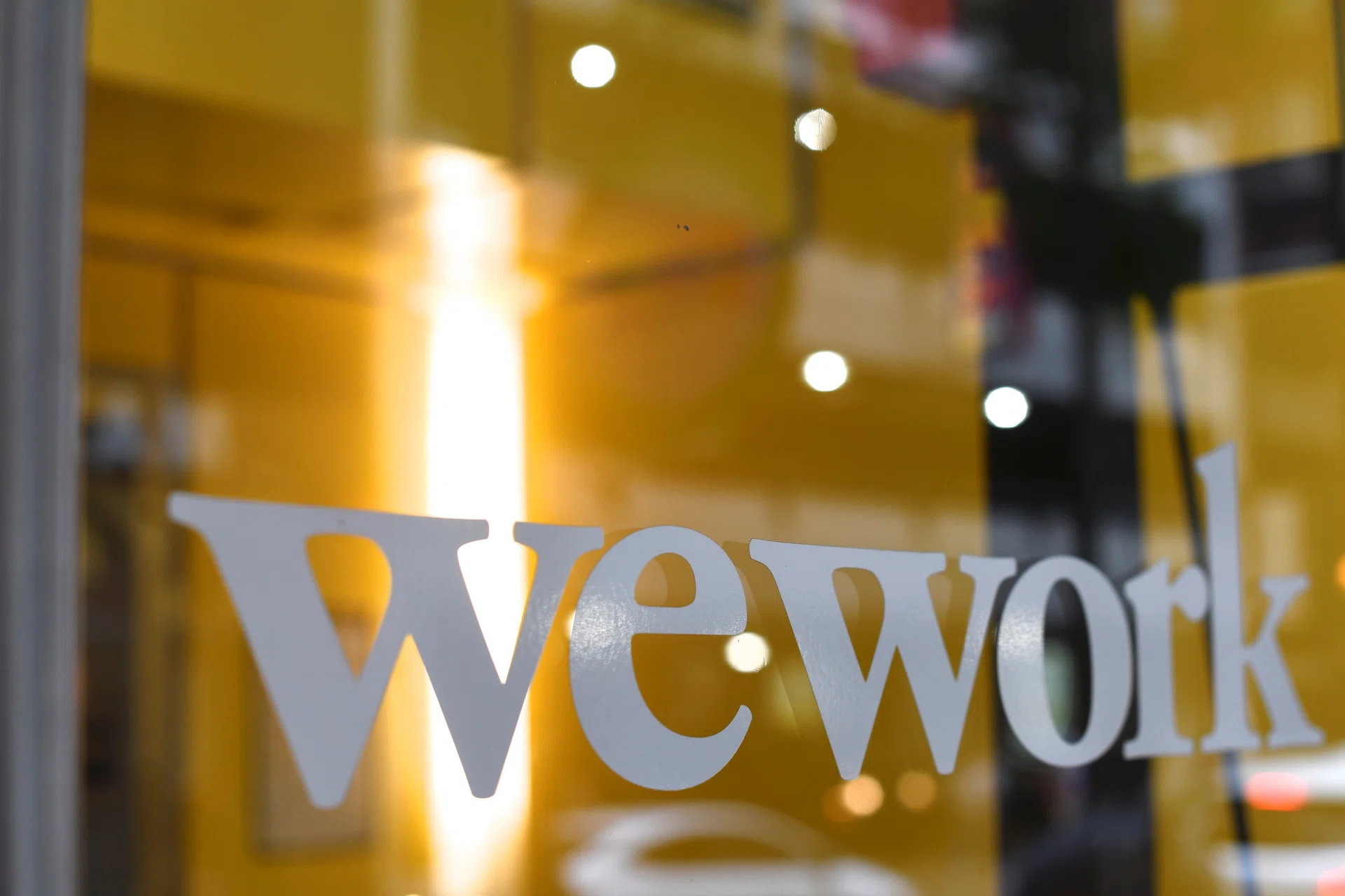 WeWork to cut about 300 global jobs as it pares back presence - The Business Times