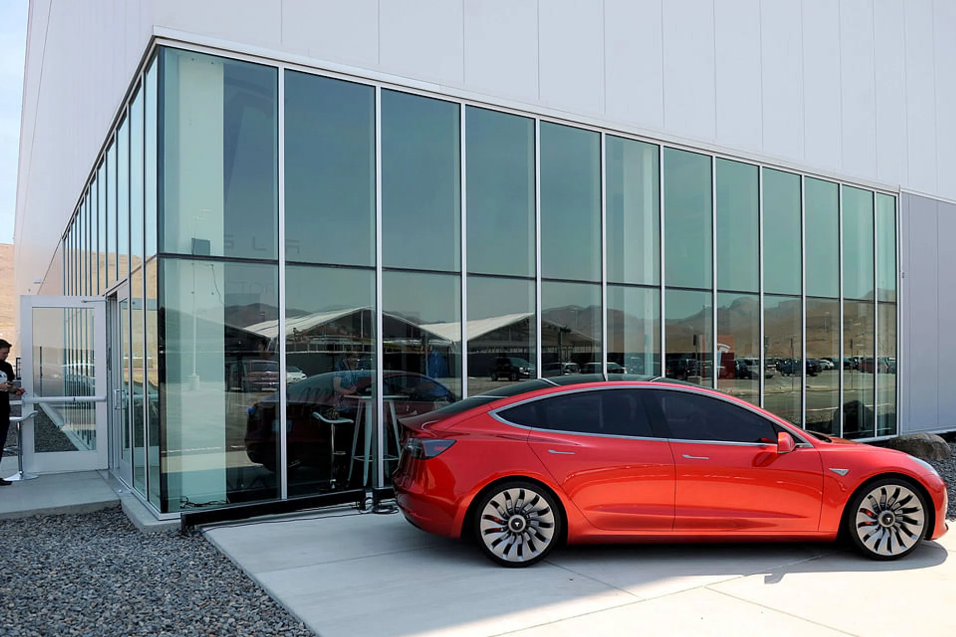Tesla's first mass-market electric car, the Model 3, hits production ...