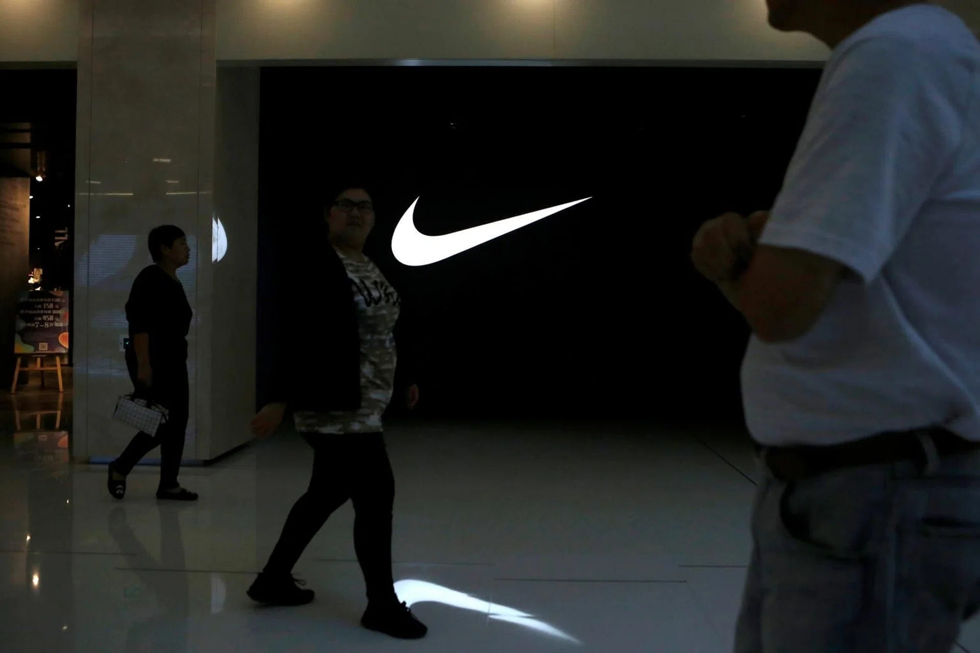 Nike earnings jump as strong pricing offsets tariff hit - The Business ...