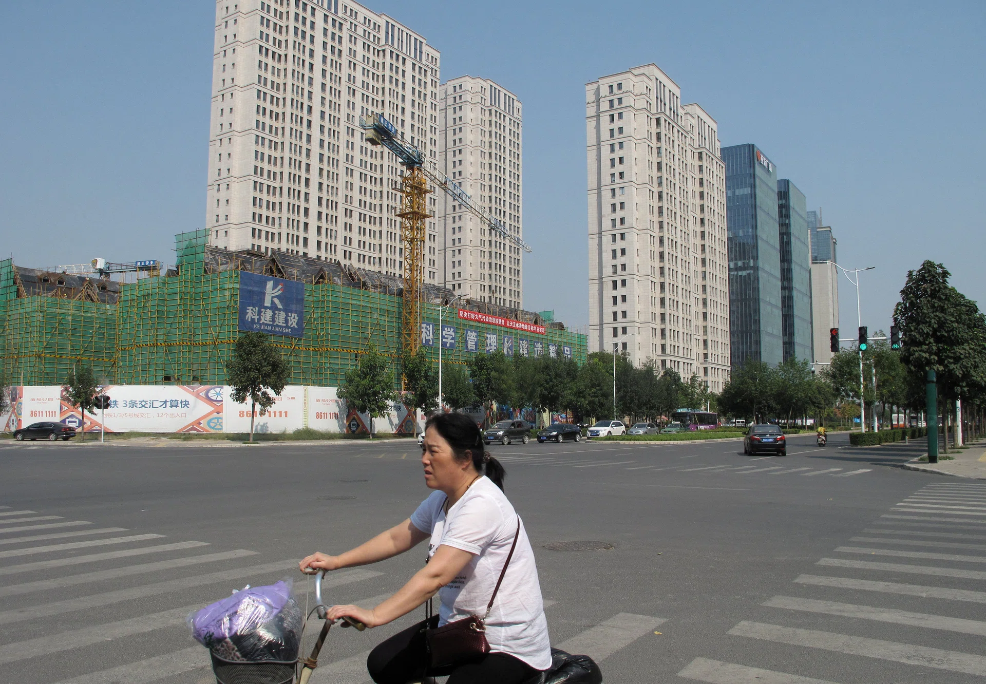 China regulator to tighten financing rules for property developers ...