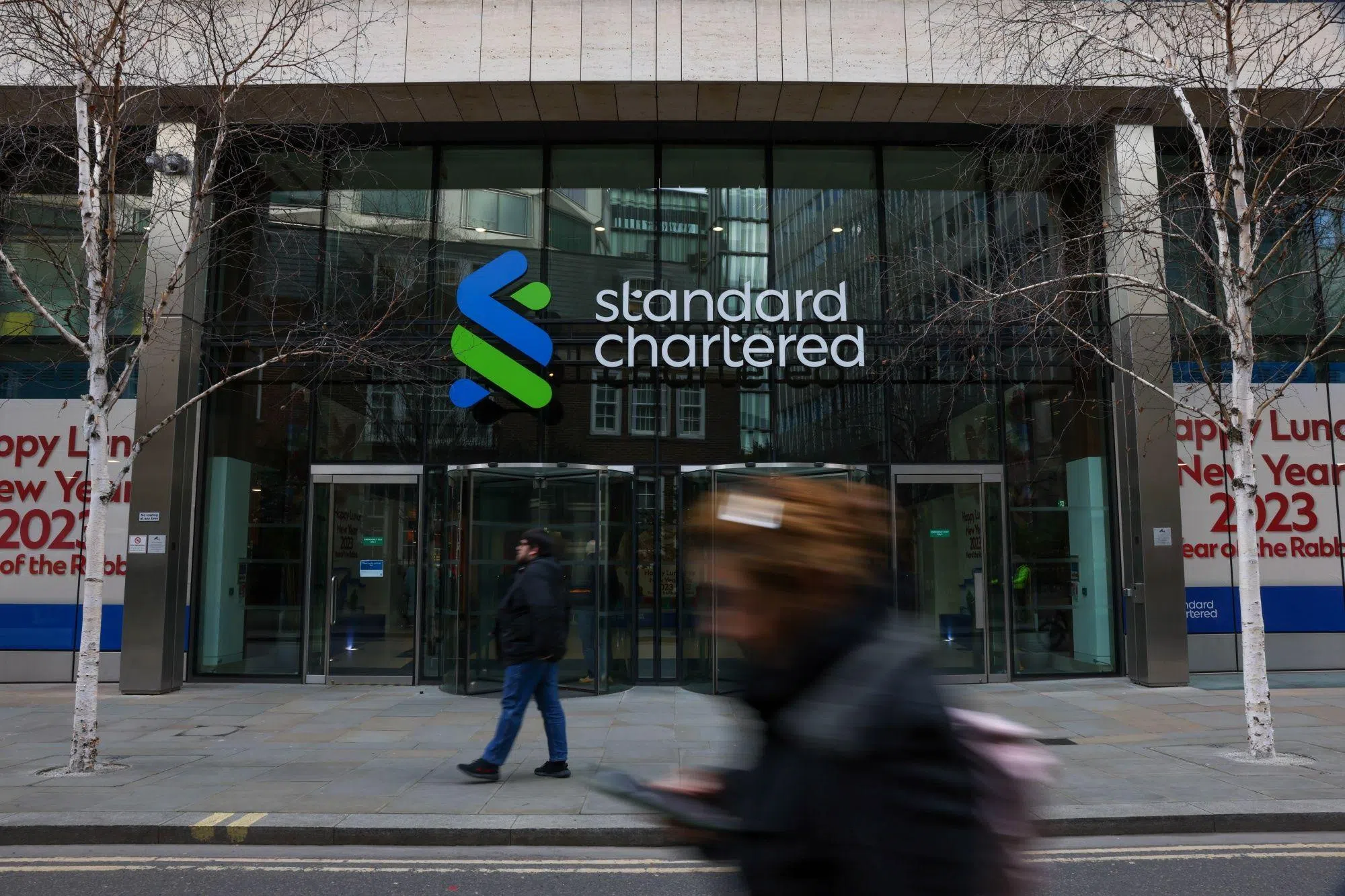StanChart raises forecasts, unveils US$1 billion buyback as profit ...