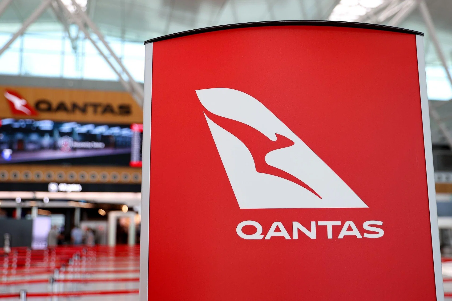 Qantas eyes record annual profit on strong travel demand, raises share ...