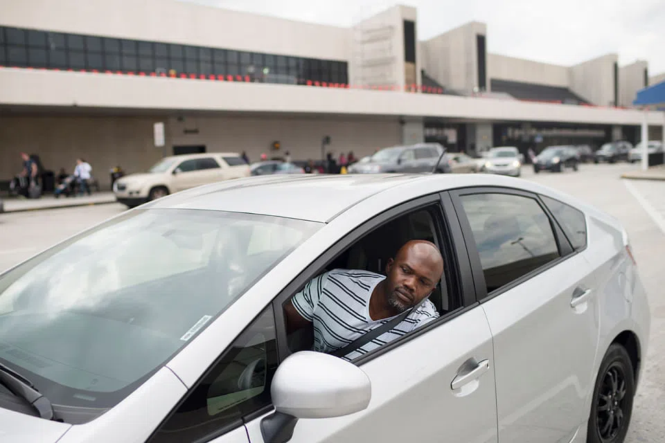 Uber drivers now doing airport pick-ups - The Business Times