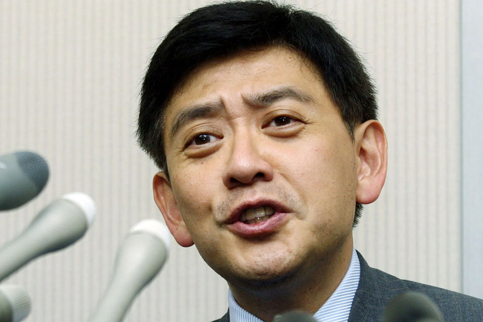 Infamous Japan activist makes comeback - The Business Times