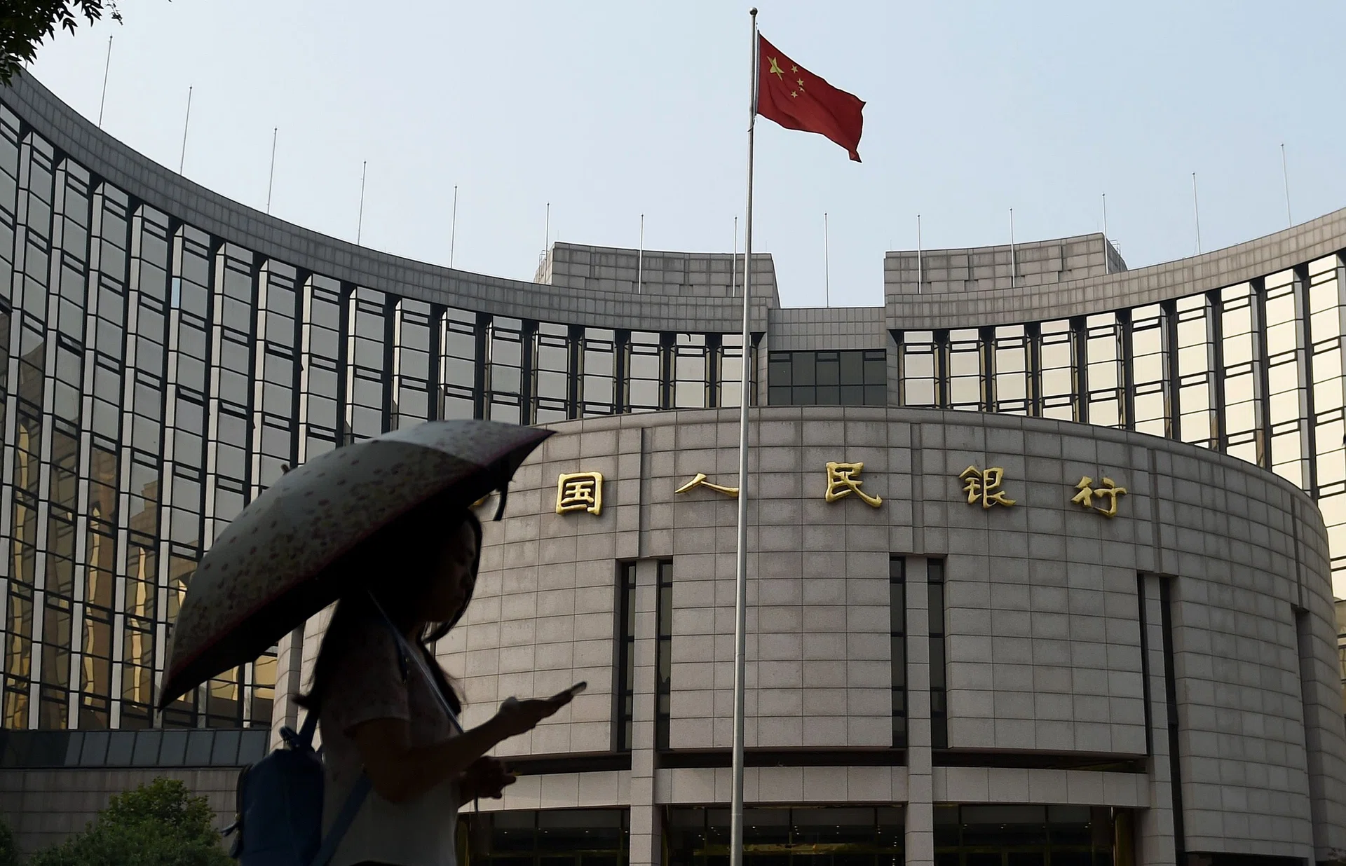 China launches yuan cross-border interbank payment system - The ...