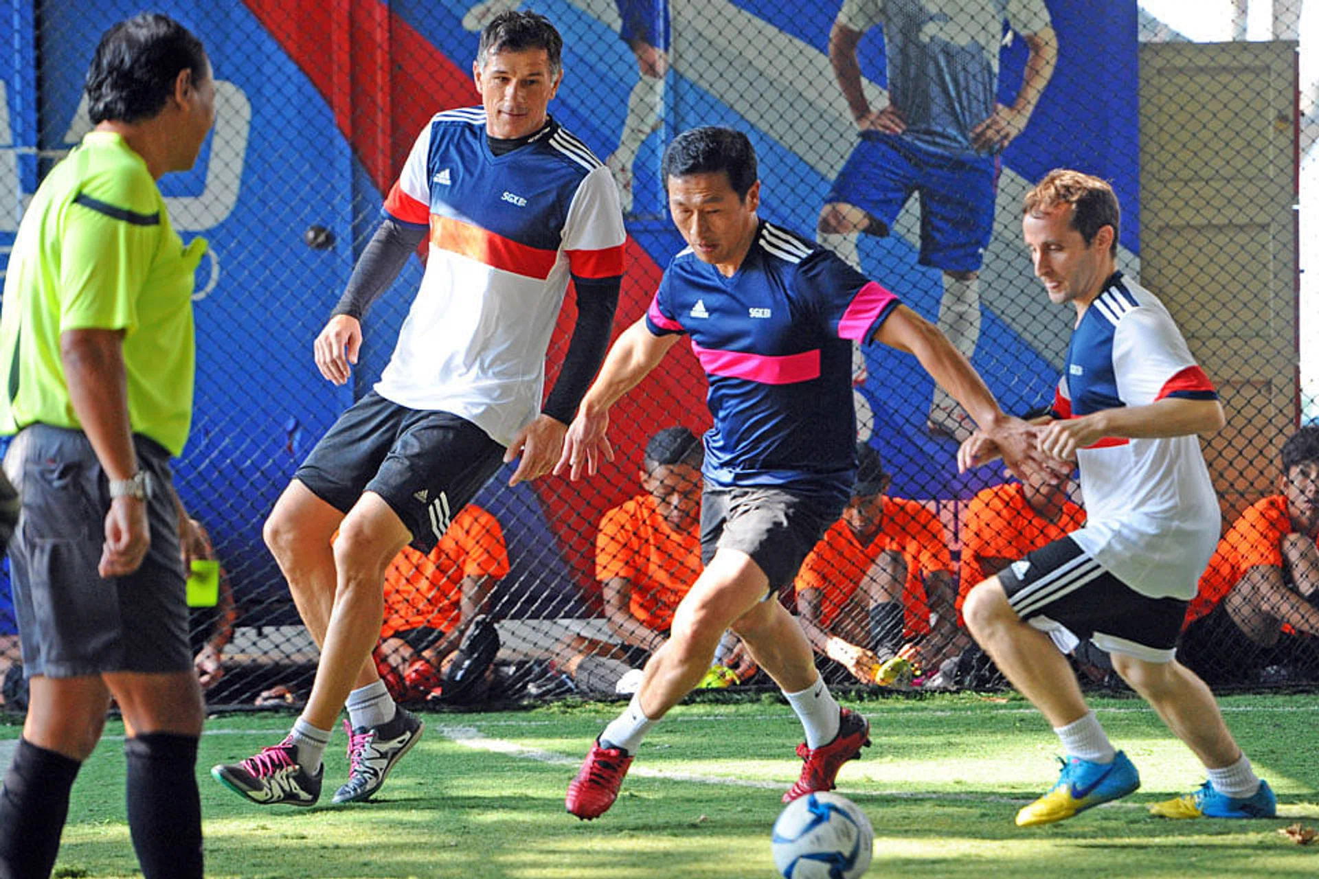 MPs turn footballers to help SGX raise S$94k for charity - The Business ...