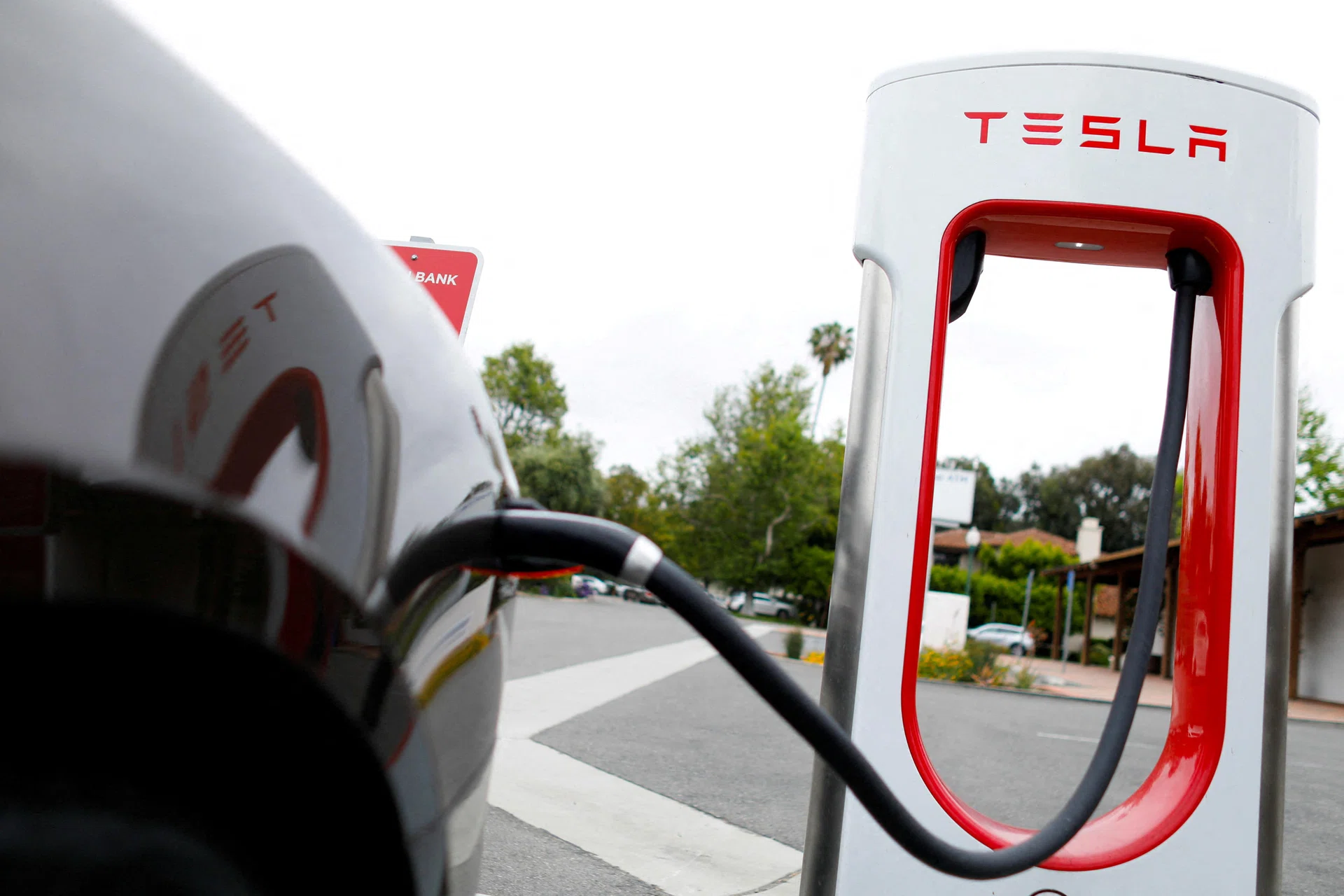Why Tesla’s EV charging plugs are becoming industry standard - The ...