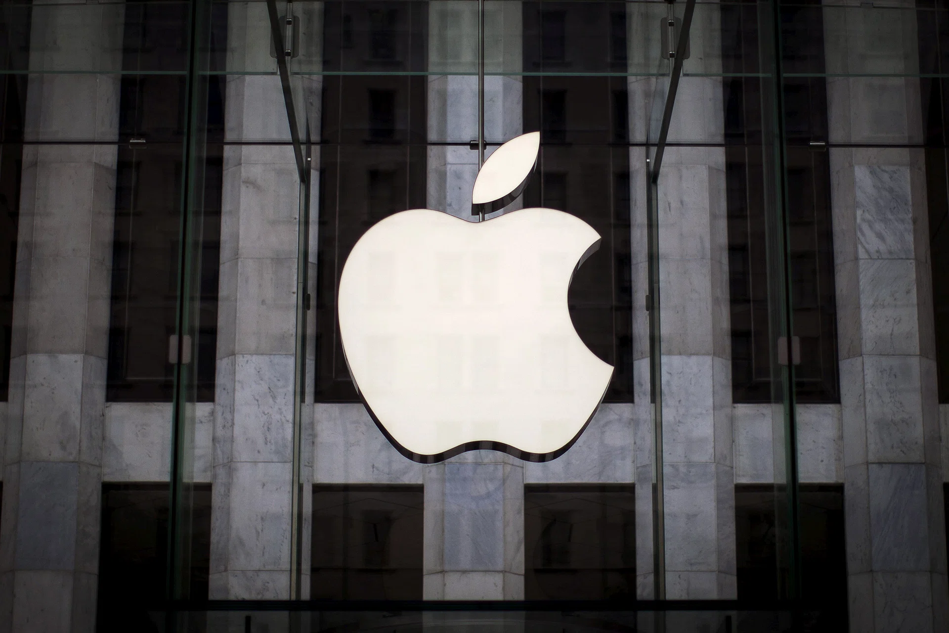 Apple iPhone sales fall but beat estimates; shares slip - The Business ...