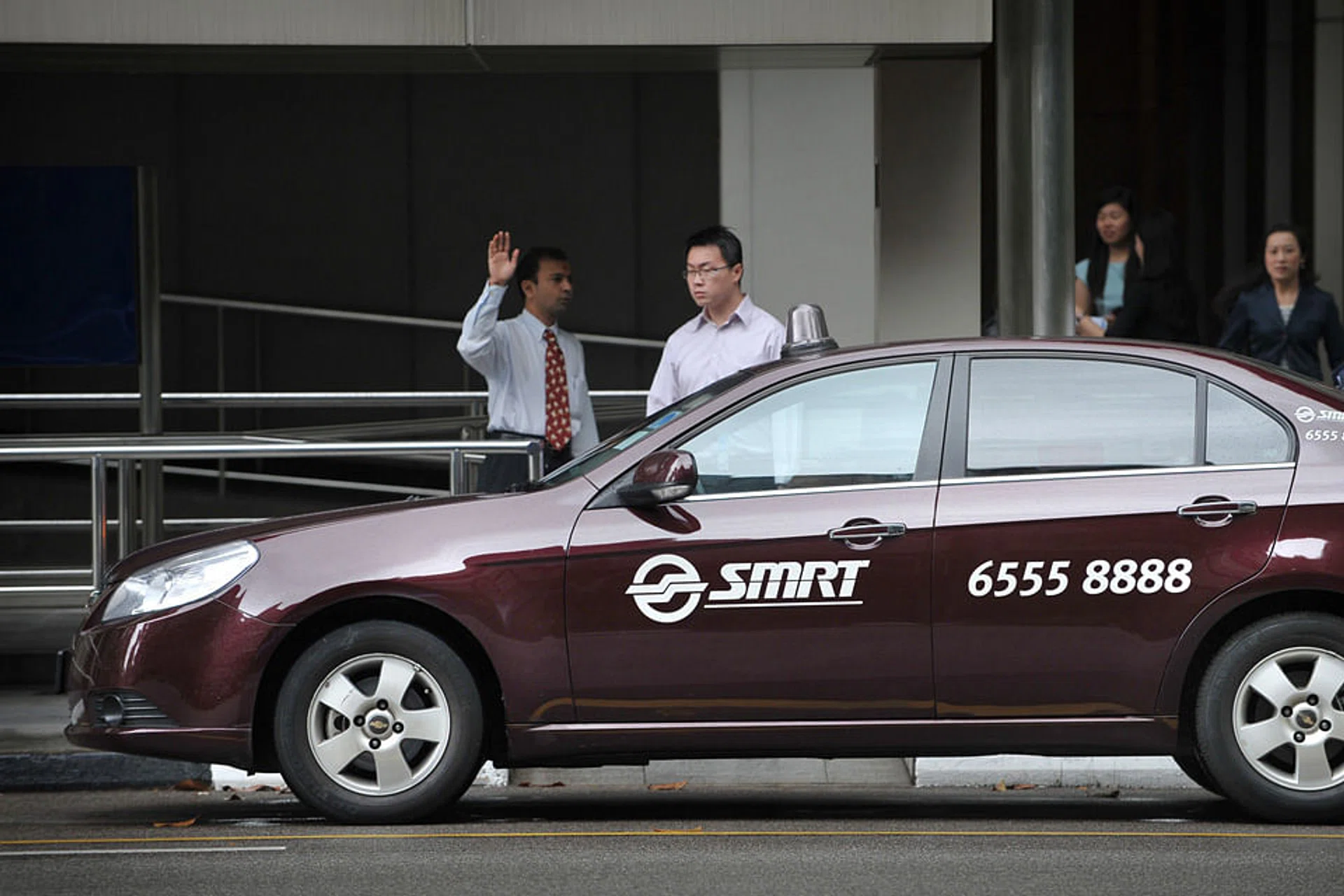 SMRT rolls out Flexi cab rental amid private hire challenge - The ...