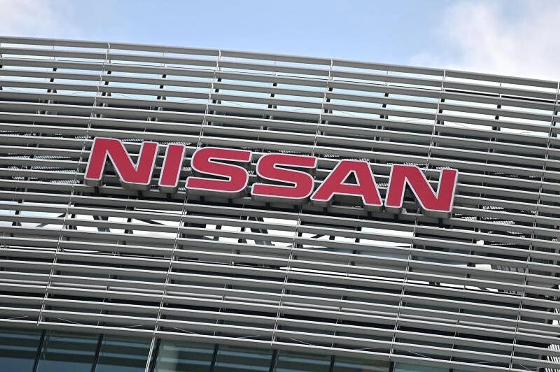 Struggling Nissan reports heavy losses, cuts production - The Business ...