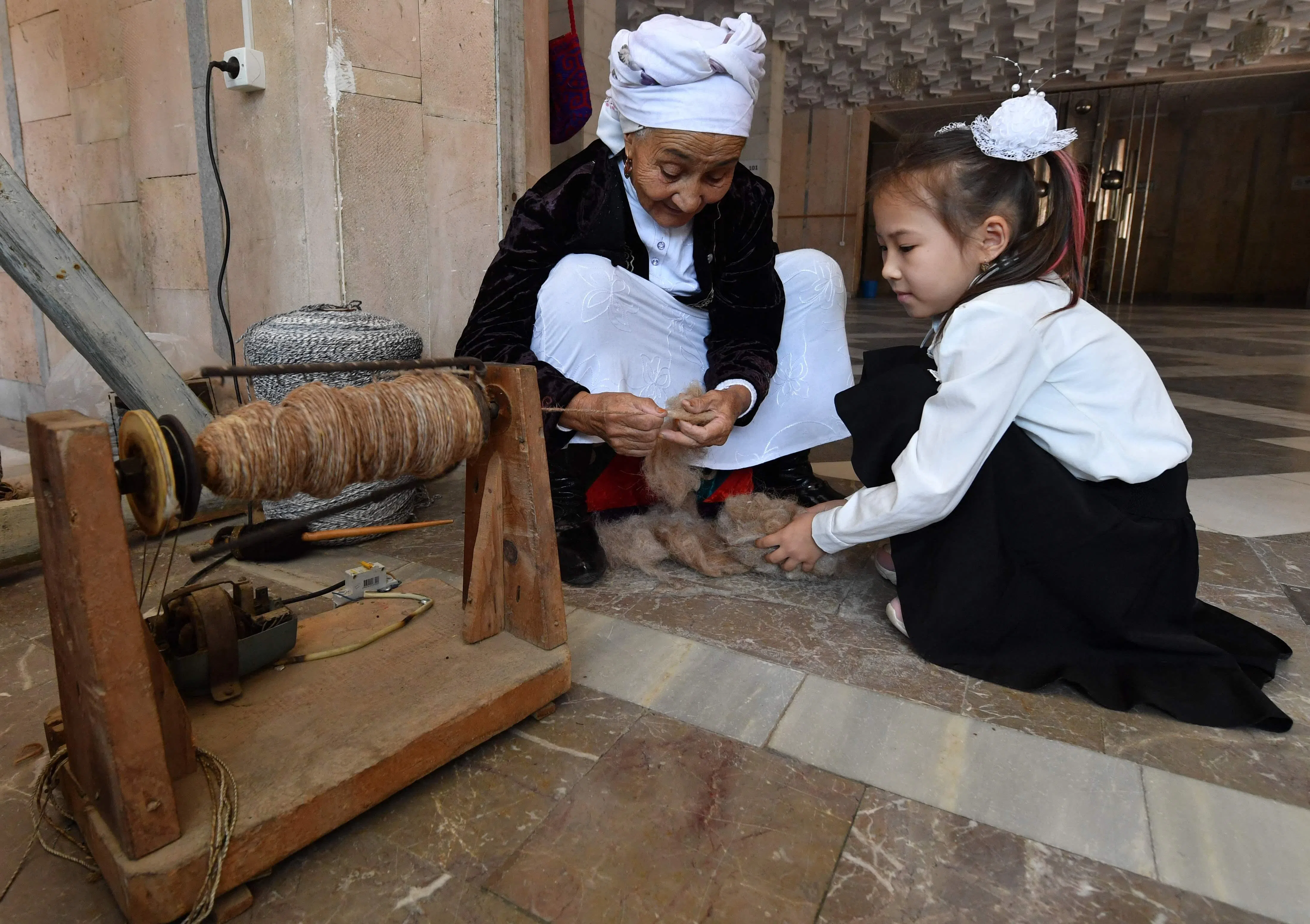 'Happy Grandmas': Women weave to protect Kyrgyzstan's ancient shyrdak ...