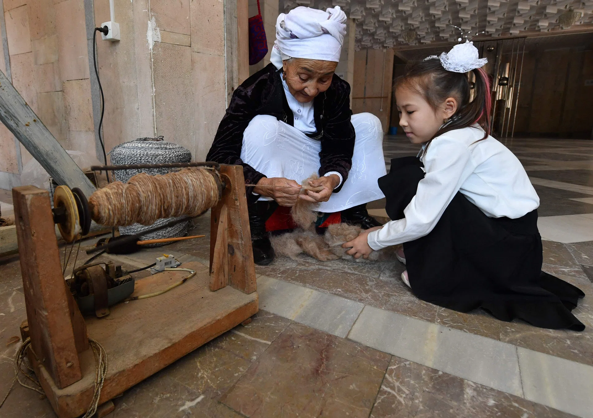 'Happy Grandmas': Women weave to protect Kyrgyzstan's ancient shyrdak ...