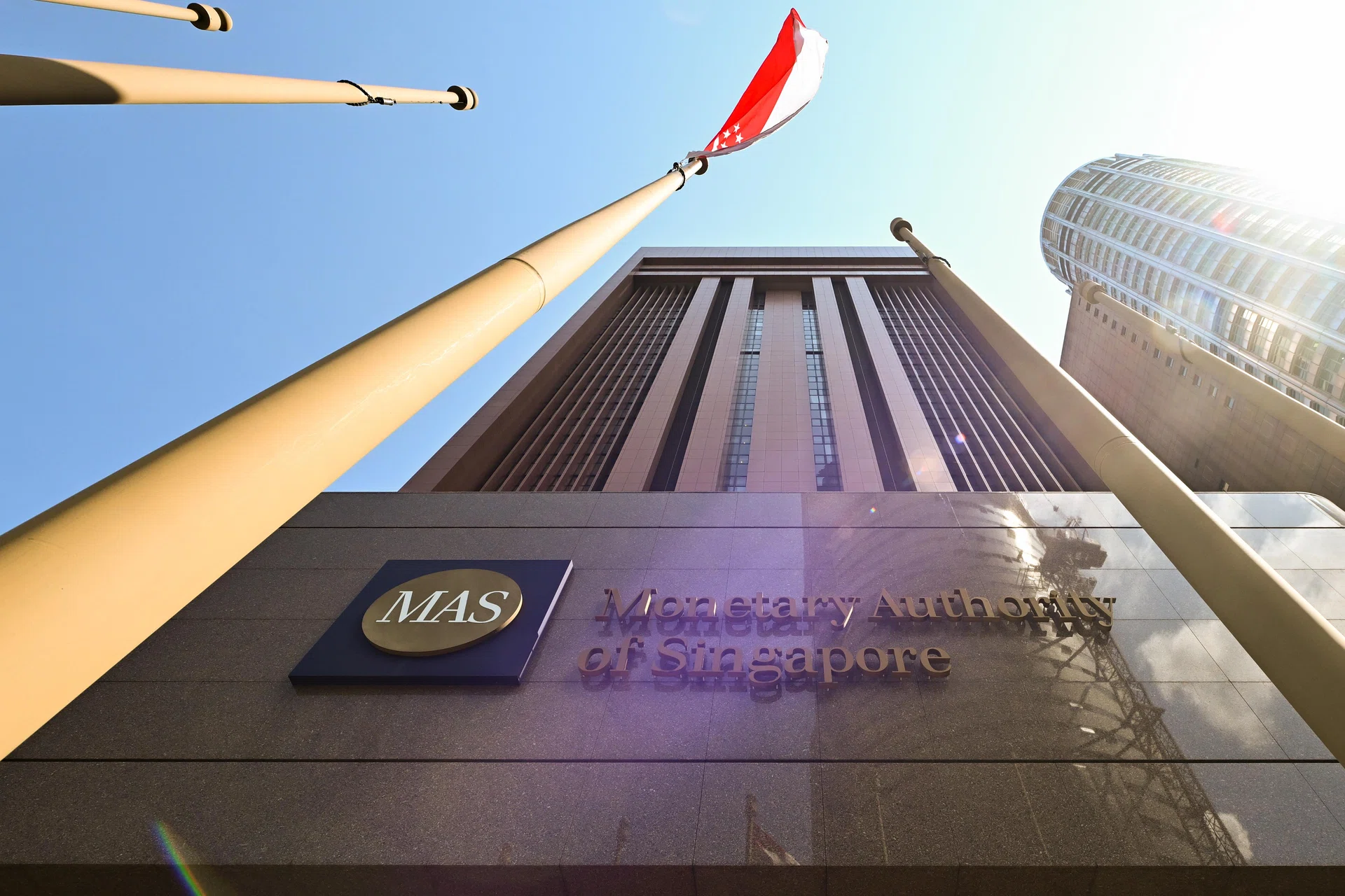 MAS maintains monetary policy as expected, lowers headline inflation ...