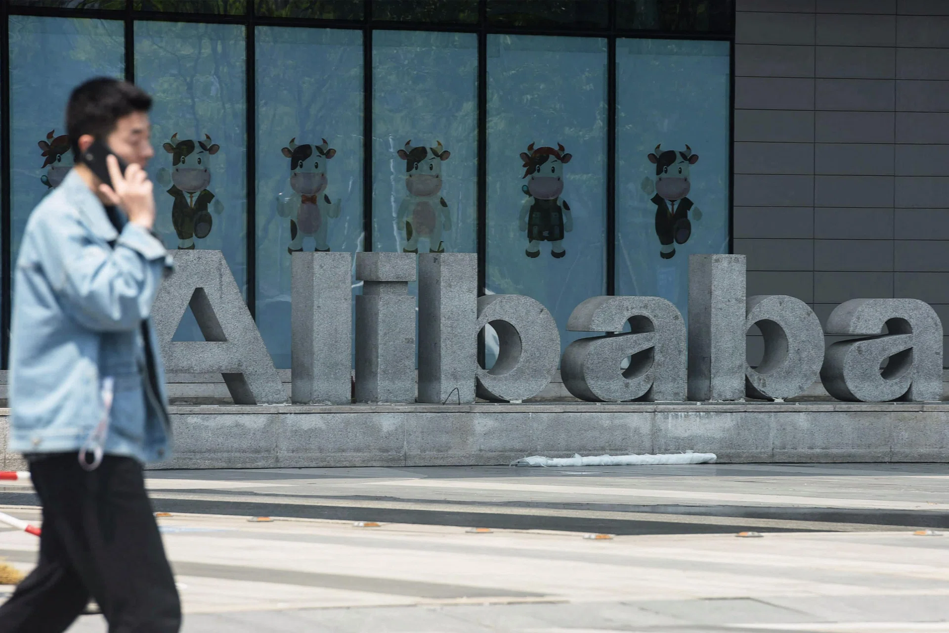 Alibaba stock slides after ex-CEO abruptly quits cloud unit ahead of ...